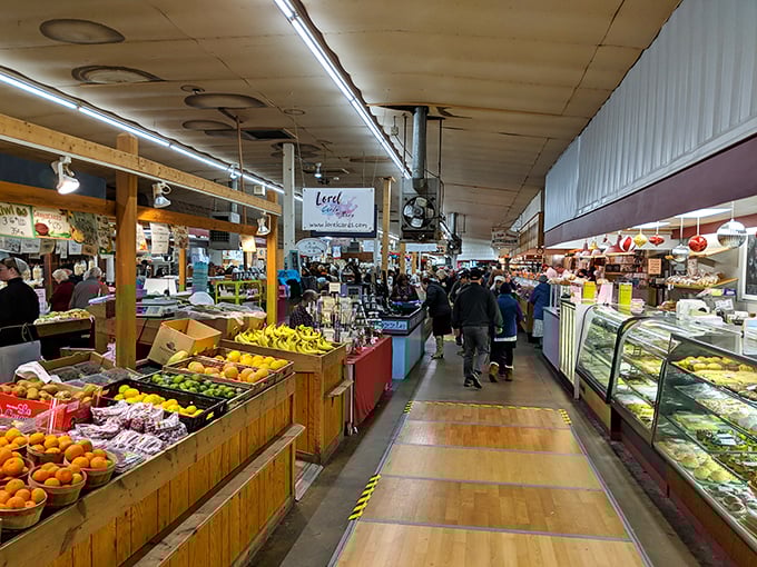 The indoor aisles of Roots Market offer a sensory feast—fresh fruits, baked goods, and the buzz of friendly conversation.