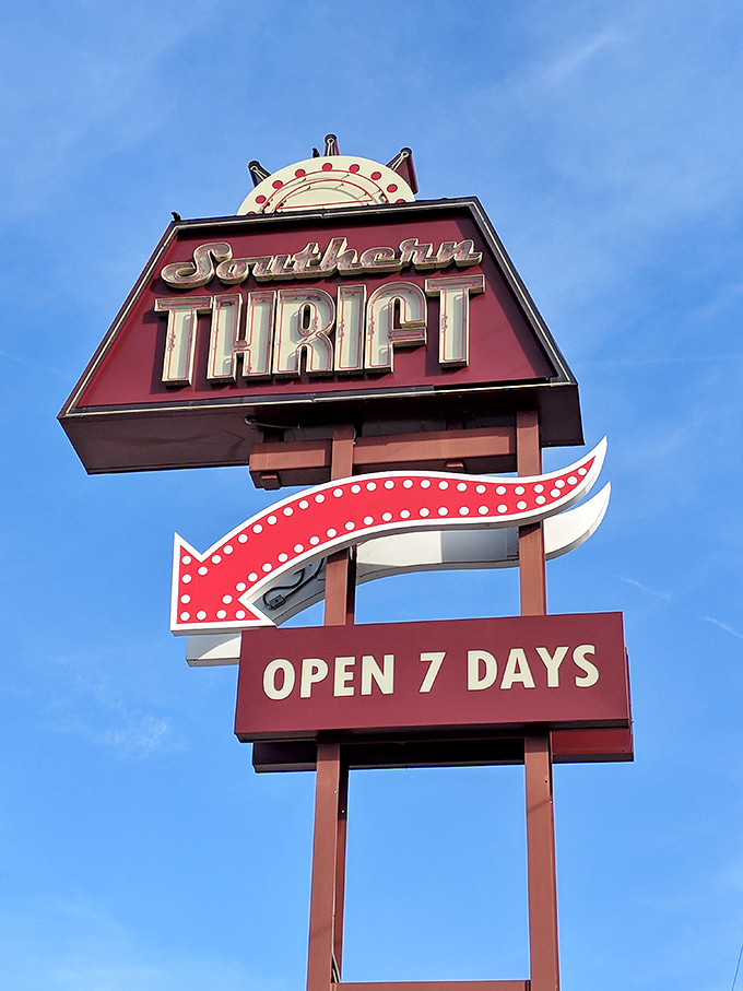 The vintage marquee sign glows against the blue sky, a beacon for thrift enthusiasts across Nashville.