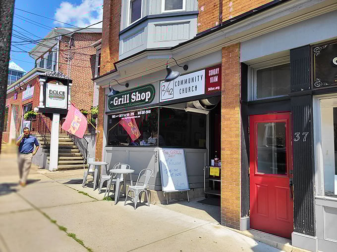 Metal chairs, simple signage, and hot dogs worth standing for—The Grill Shoppe knows fancy decor can't compete with perfect flavor.