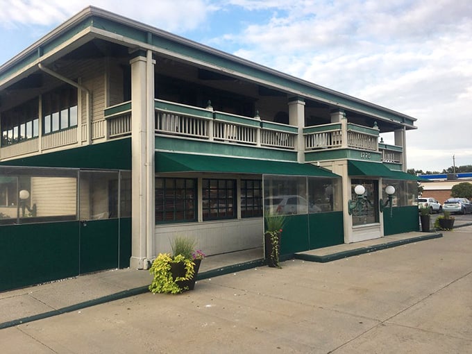 Green awnings and classic white siding—The Masters looks like it should be serving seafood, but wait till you try their perfectly seared filet!