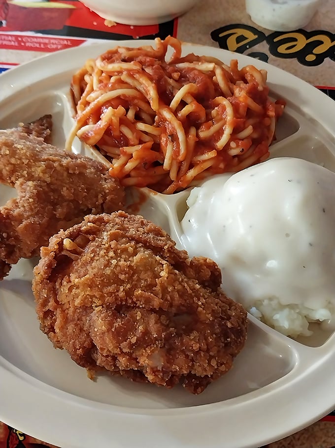 Whoever decided fried chicken and spaghetti belong together deserves a Nobel Prize in comfort food diplomacy.