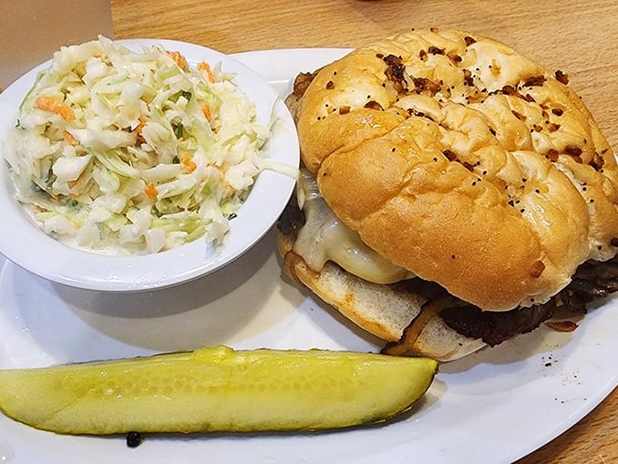 Meet the Abba – a sandwich so substantial it deserves its own zip code, accompanied by a refreshing scoop of homemade coleslaw.