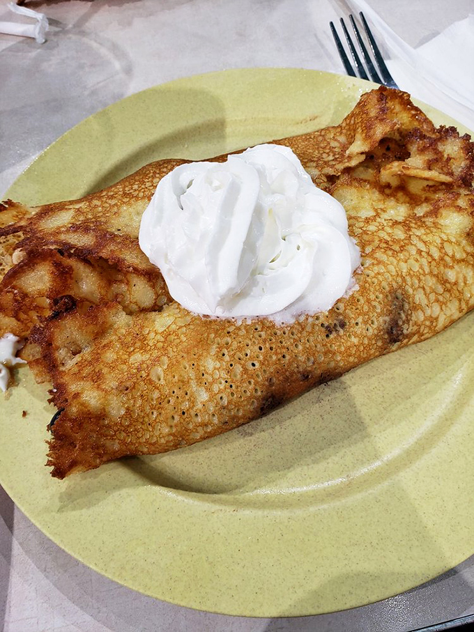 These hotcakes aren't just folded—they're lovingly cradled around their fillings like a grandmother hugging her favorite grandchild.
