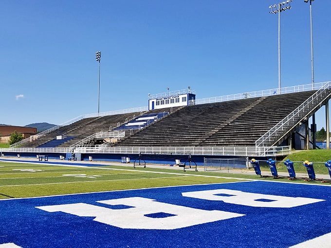 The local stadium stands ready for game day, where cheering for the home team is practically written into the town charter.
