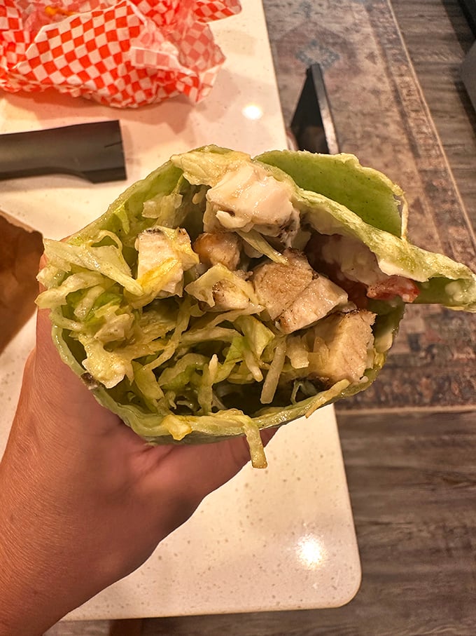 Fresh, crisp, and stuffed with grilled chicken, this Caesar pita proves that not all heroes wear capes—some wear lettuce wraps.