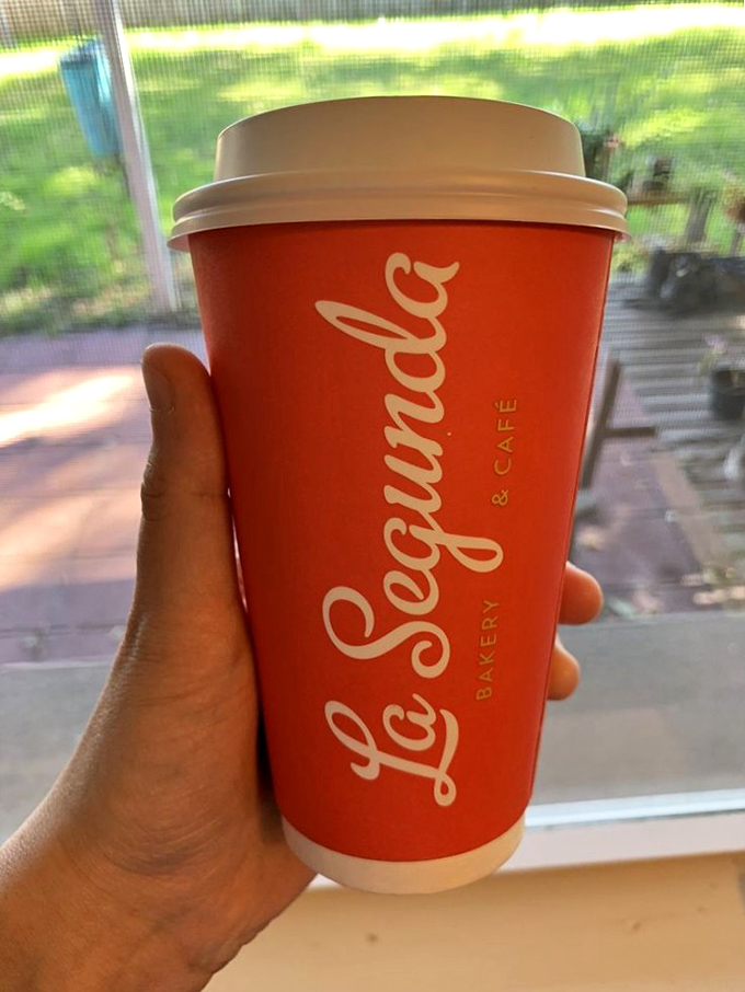The café con leche comes in a signature coral cup that says, "Yes, this is the real deal," and yes, it will ruin all other coffee experiences for you.