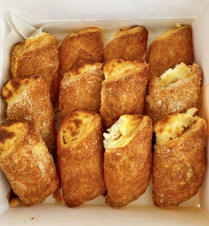 These cheese rolls aren't just pastries—they're what would happen if a croissant and cream cheese eloped and lived happily ever after.