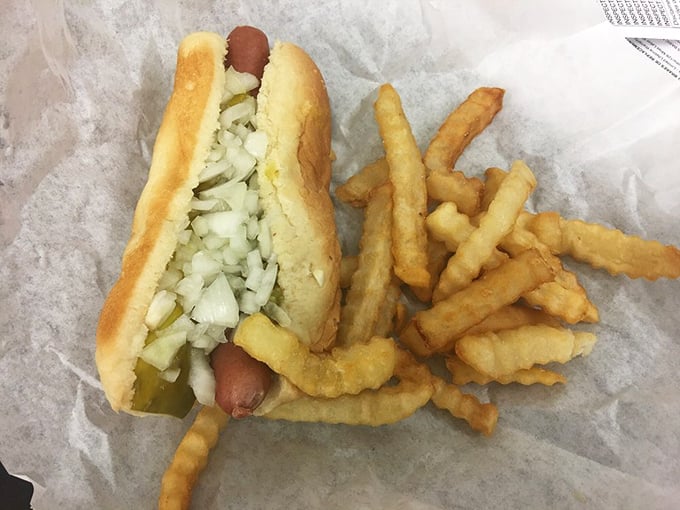 The Chicago-style hot dog—a symphony of toppings where ketchup dare not tread. Poetry in a poppy seed bun.