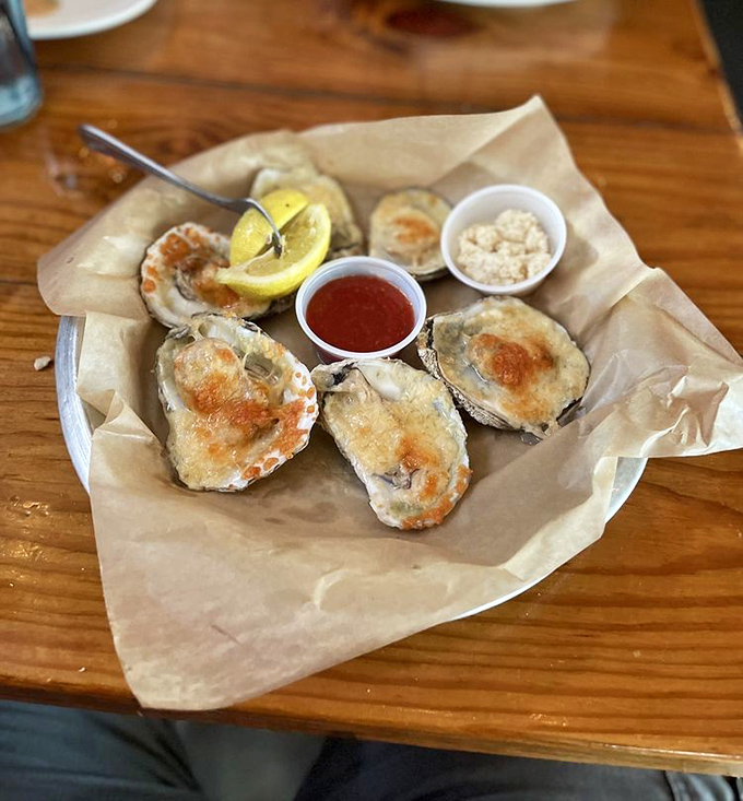 These baked oysters wear their garlic butter and Parmesan like a designer outfit—dressed to impress and ready for their close-up.