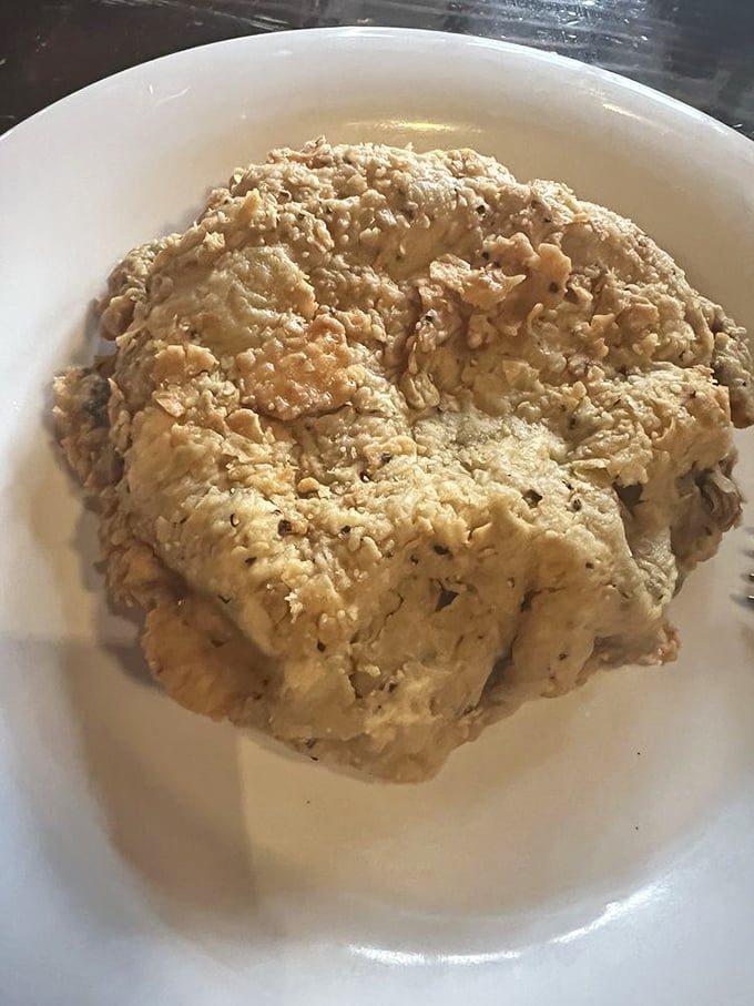 This isn't just chicken fried steak – it's a Texas-sized cloud of crispy, savory heaven that makes vegetarians question their life choices.