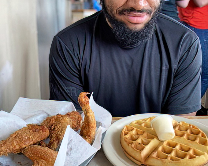 Chicken and waffles: the breakfast equivalent of a power couple, proving that opposites don't just attract—they create culinary magic.