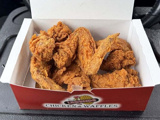 This red box contains what philosophers call "happiness in tangible form"—crispy wings with a batter so perfect it deserves its own hall of fame.