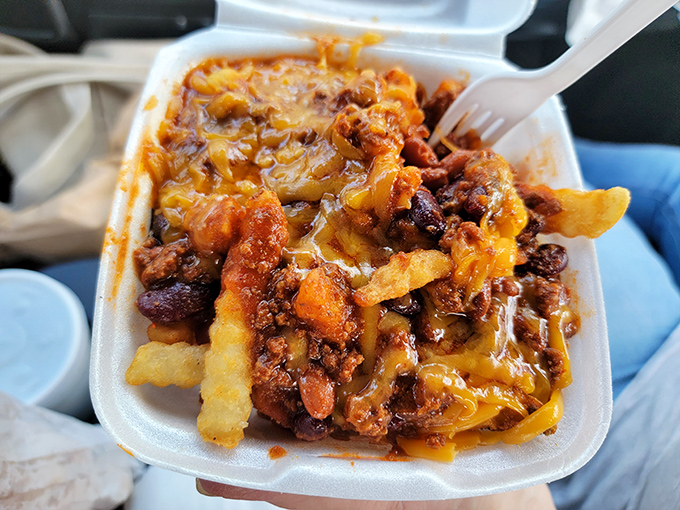 Chili cheese fries that require both a fork and a moment of silent appreciation. Diet plans come with a pause button for a reason.