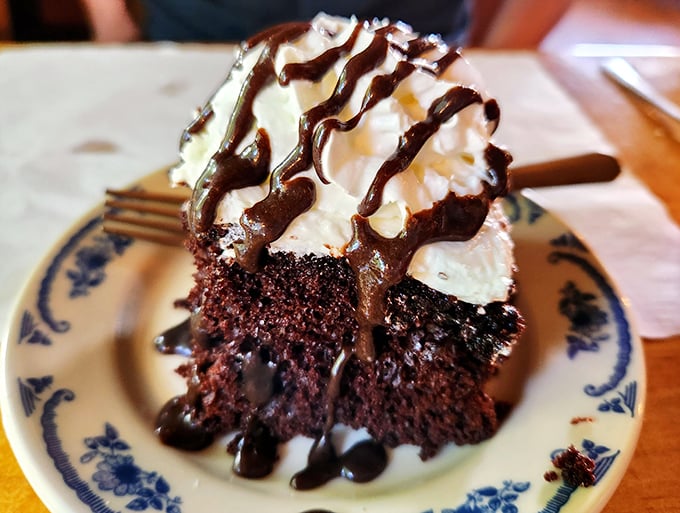 Chocolate cake with a dollop of nostalgia—the kind of dessert that makes you consider licking the plate when nobody's looking.