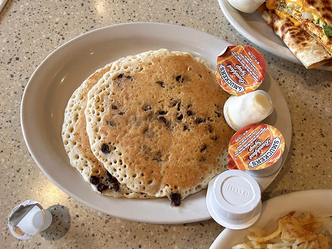 Chocolate chip pancakes—proof that sometimes dessert masquerading as breakfast is exactly what the soul needs.