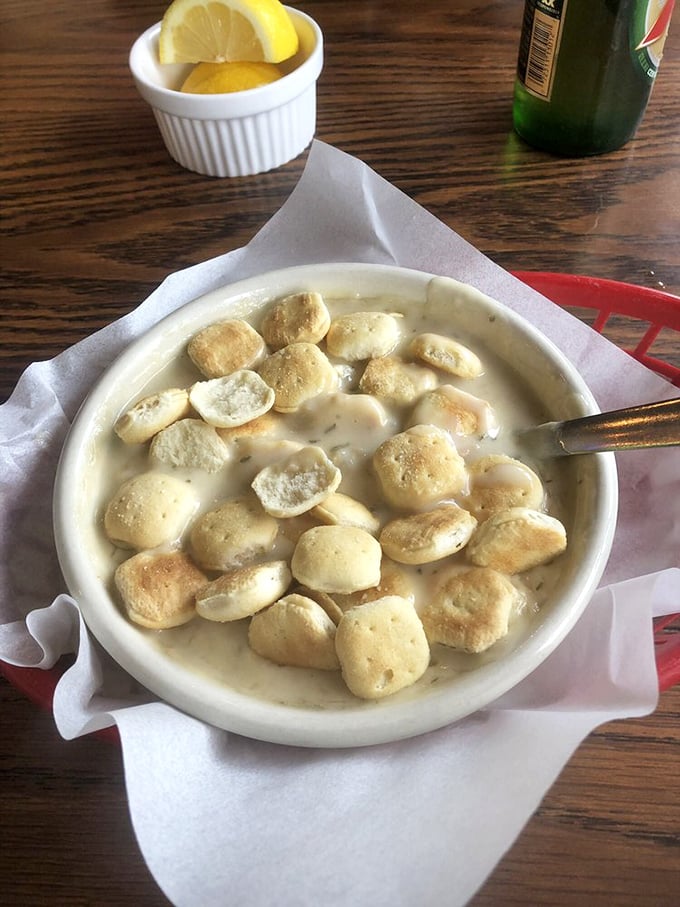 Not just clam chowder—a warm hug in a bowl. Those pillowy oyster crackers floating like delicious life rafts in creamy seas.