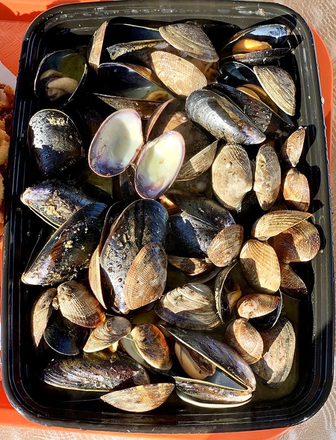 These steamed mussels and clams aren't just seafood—they're little oceanic time capsules, each shell opening to reveal the pure essence of the Pacific.