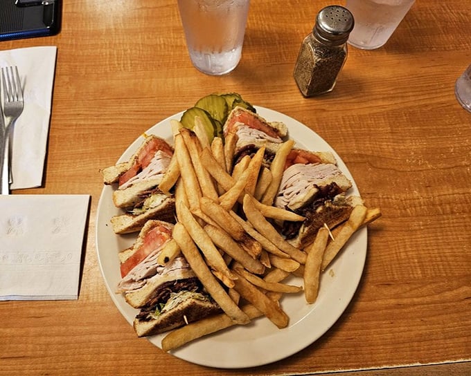 The club sandwich—architectural marvel of the diner world, where each layer tells its own delicious story.