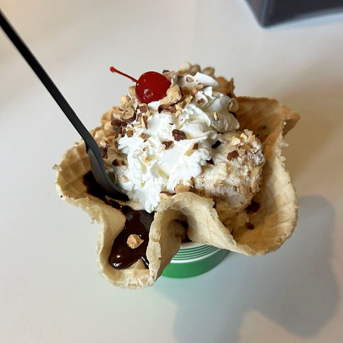 This waffle bowl creation isn't just dessert—it's performance art with a cherry on top that deserves its own standing ovation.