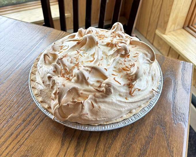 This coconut cream pie doesn't just end a meal—it crowns it with a cloud of meringue that would make angels jealous.