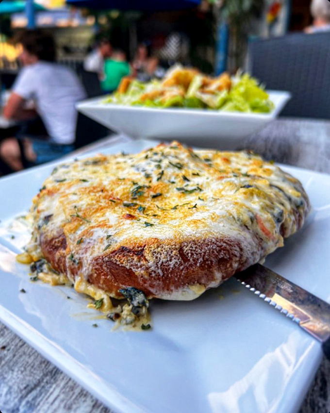 Behold the Crabby Pretzel—where seafood meets Pennsylvania Dutch tradition in a melty, cheesy masterpiece that demands to be photographed.