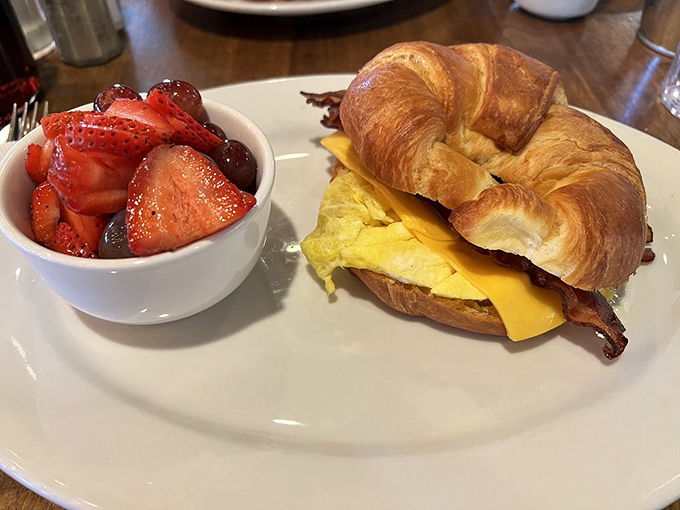 The croissant sandwich with fresh berries—proof that balance exists in the universe. One bite of indulgence, one bite of virtue.