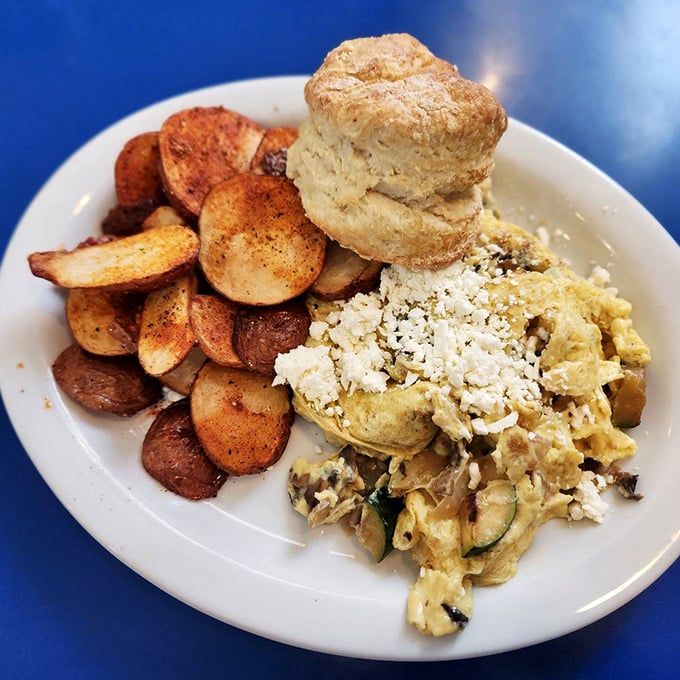 When scrambled eggs and potatoes get dressed up for a special occasion. That biscuit's not just a side—it's a supporting actor.