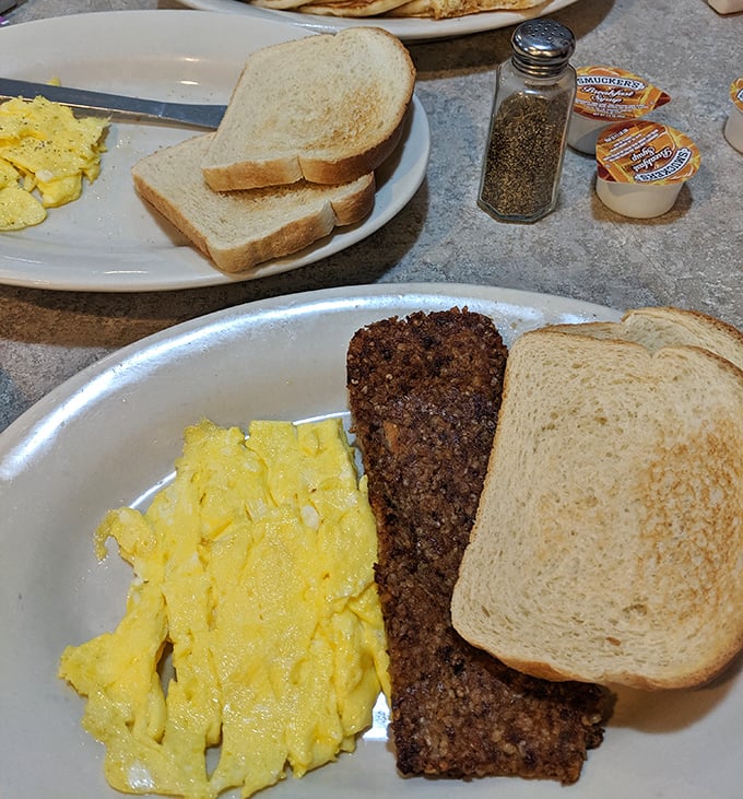 Breakfast doesn't get more Cincinnati than this—golden eggs alongside goetta, that magical meat-and-grain mixture that fuels the city.