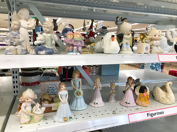A porcelain army stands at attention. These figurines once graced grandma's curio cabinet—now they're waiting for their next mantelpiece moment.