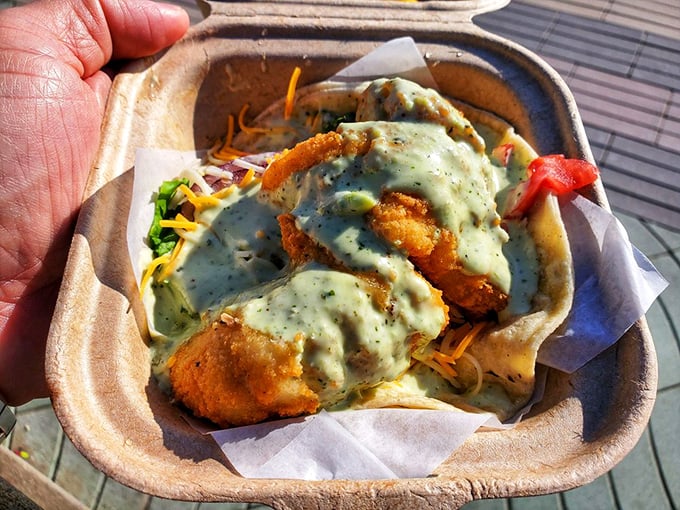 Not your average fish tacos – these are the kind that make you seriously consider moving to a beach town permanently.