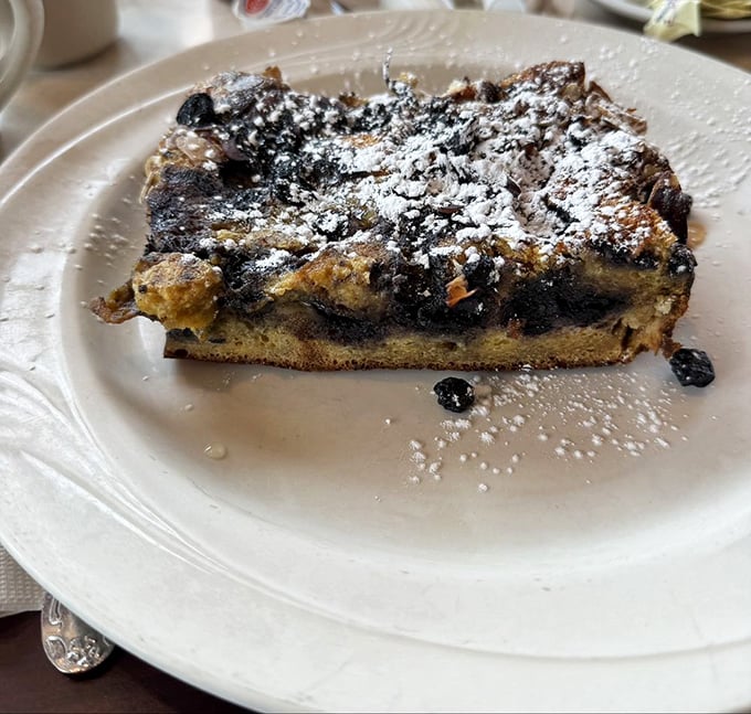 This isn't just French toast – it's a sweet masterpiece studded with blueberries and dusted with powdered sugar. Breakfast or dessert? Why choose when you can have both?