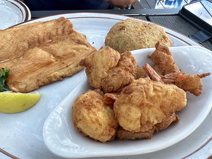 A fried seafood platter that doesn't mess around—this isn't diet food, it's joy food, and sometimes that's exactly what the soul needs.