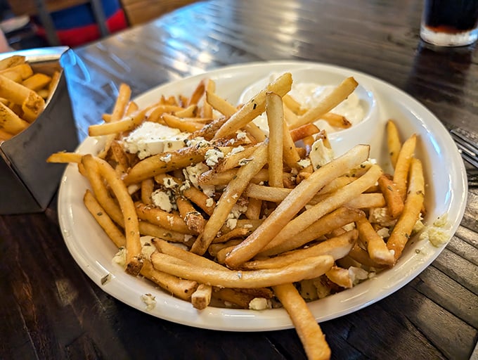 These aren't just fries – they're golden Pennsylvania treasures dusted with cheese that demand to be savored slowly.