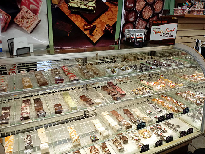 The chocolate display case – where adults press their noses against glass with the same gleeful anticipation they did as children.