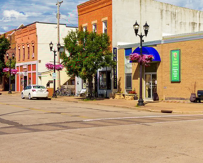 Grand Avenue's historic buildings sport hanging flower baskets like jewelry. This street doesn't need to try hard to charm—it comes naturally after a century of practice.