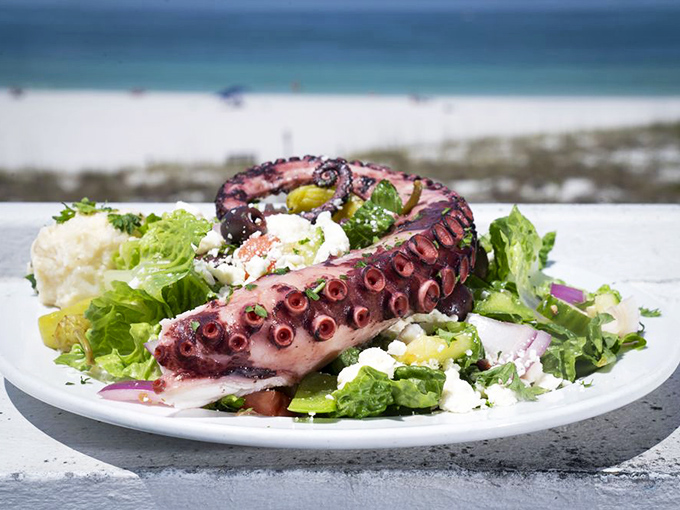 This octopus Greek salad could convert even the most tentacle-averse diner – tender, charred, and perfectly at home among the fresh greens.