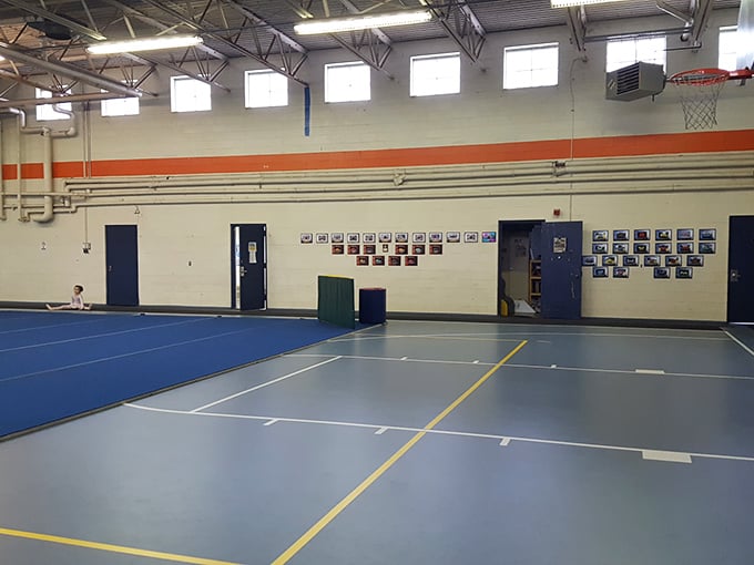 This recreation hall might lack architectural flair, but it's where community happens—basketball games, town meetings, and the occasional heated debate about zoning.