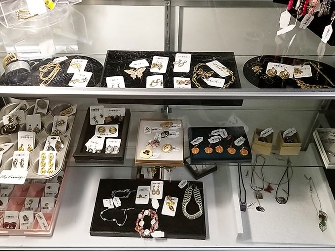 The jewelry counter sparkles with possibility. That perfect vintage brooch your grandmother once wore might be hiding right here.