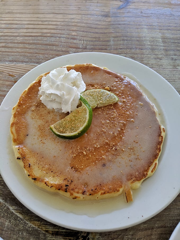 Key lime pancake—Florida's answer to the question: "Can breakfast be both comforting and exciting?" The lime wedges aren't just garnish, they're an exclamation point. 