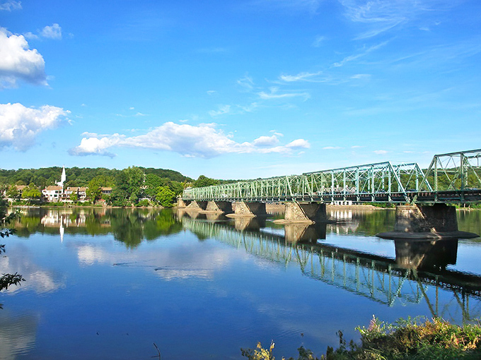The New Hope-Lambertville Bridge spans more than just the Delaware River—it connects two states in a perfect marriage of small-town charm.