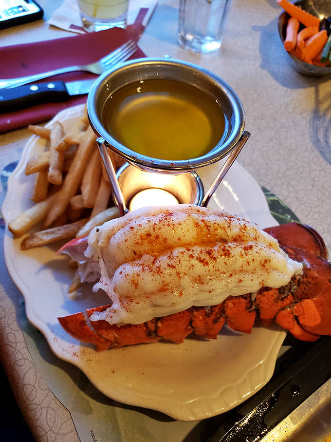 This lobster tail isn't just dinner—it's a butter-bathed celebration that makes you wonder why you ever waste stomach space on lesser foods.