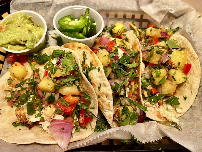 These tacos aren't just filled—they're composed, with each ingredient playing its part in a symphony of flavors that Mozart would have traded his piano for.