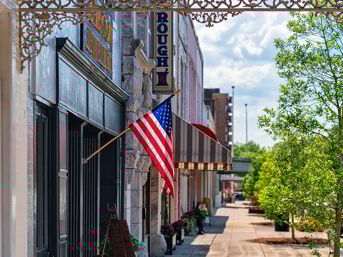 Broad Street's storefronts fly the flag with pride—this isn't just a shopping district, it's Main Street America done right.