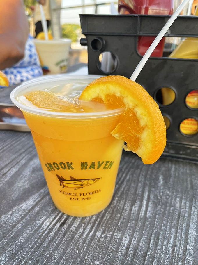 Sunshine in a cup. This mango piña colada doesn't just quench your thirst—it tells stories of tropical breezes and Jimmy Buffett melodies.
