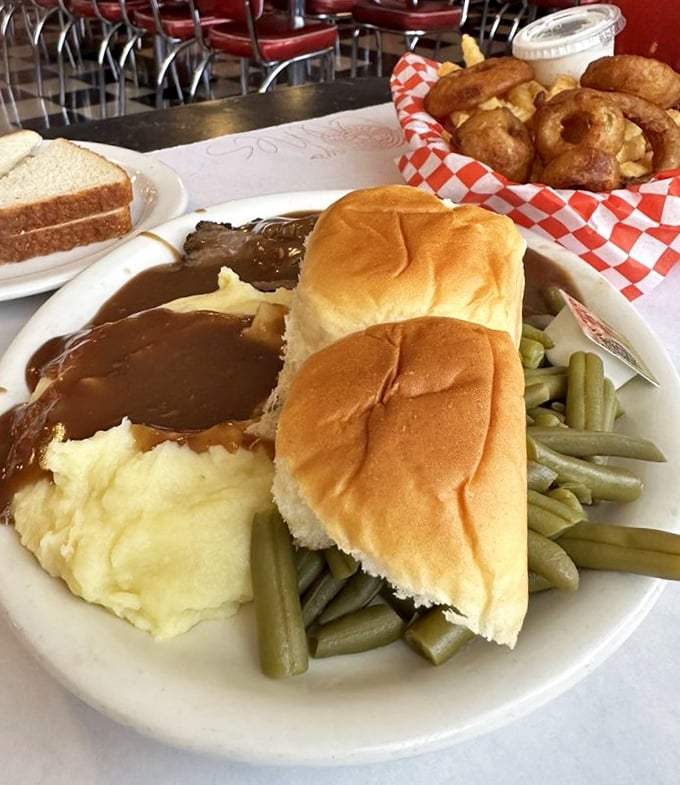 A feast that would make June Cleaver proud. When three different comfort foods share a plate, it's not dinner – it's therapy.
