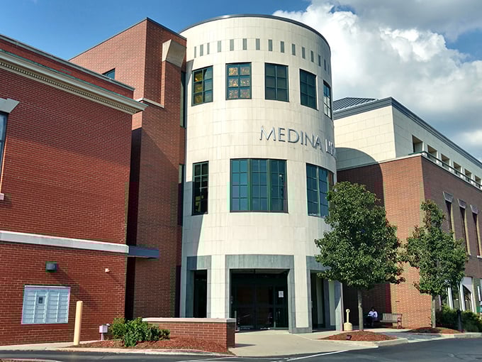 Medina's library brings modern architecture to town with its curved façade—proving you can indeed judge a book by its cover when the cover's this impressive.