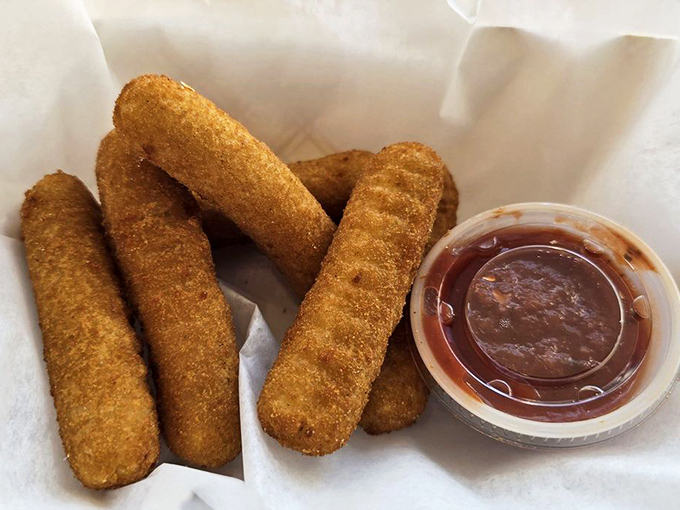Mozzarella sticks – where the stretch between your plate and mouth becomes a spectator sport worth the price of admission.