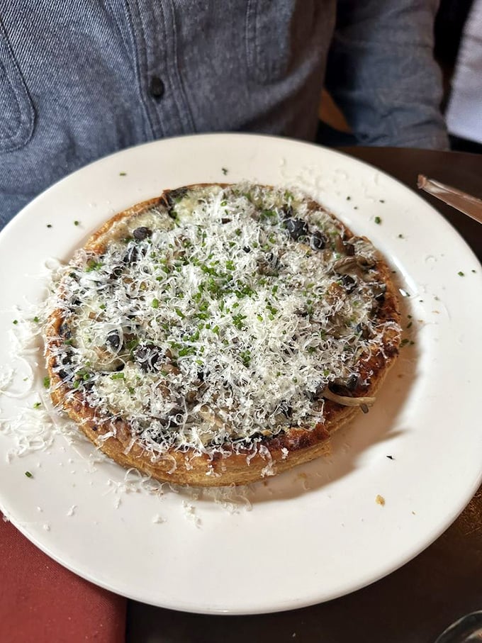 This mushroom tart with its shower of Parmesan is what vegetarian dreams are made of. Earthy, rich, and utterly satisfying.
