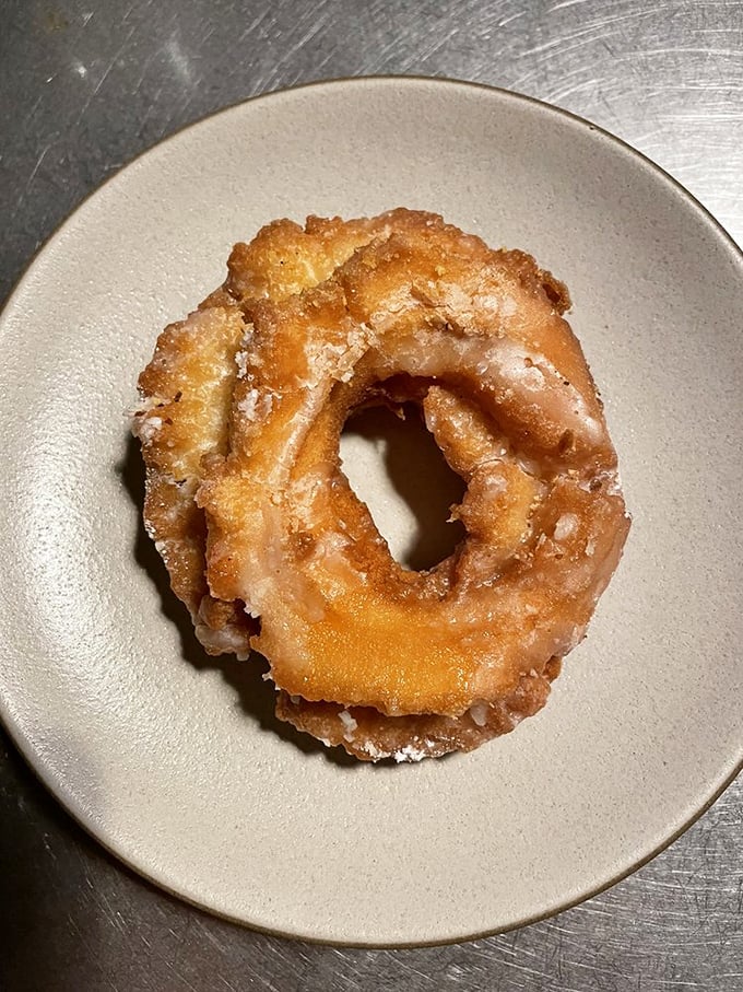 The old-fashioned glazed—craggier than its raised cousin, with nooks and crannies designed by nature to capture maximum sweetness.