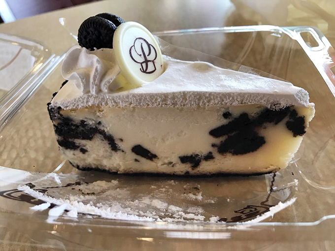 Cookies and cream meet cheesecake perfection. The Oreo bits aren't just mixed in—they're having their own little party and we're all invited.
